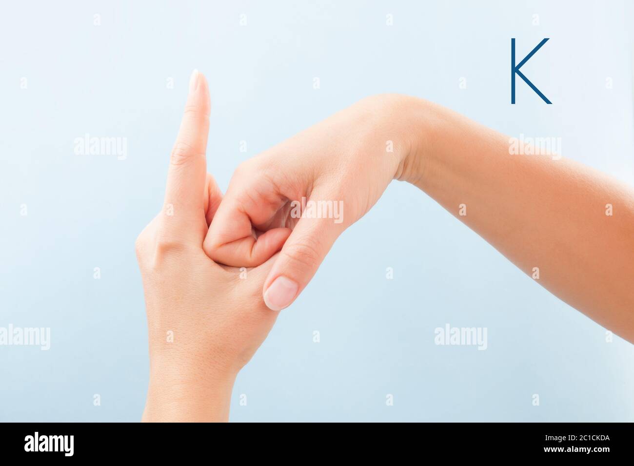 BSL Fingerspelling alphabet K Stock Photo - Alamy