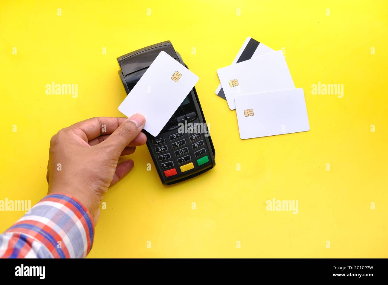 Payment terminal charging from a card, contactless payment Stock Photo ...