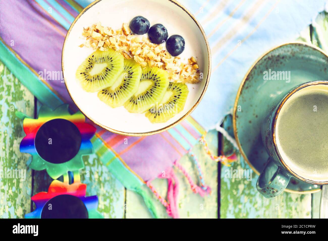Cup of granola with yogurt and fruit Stock Photo - Alamy