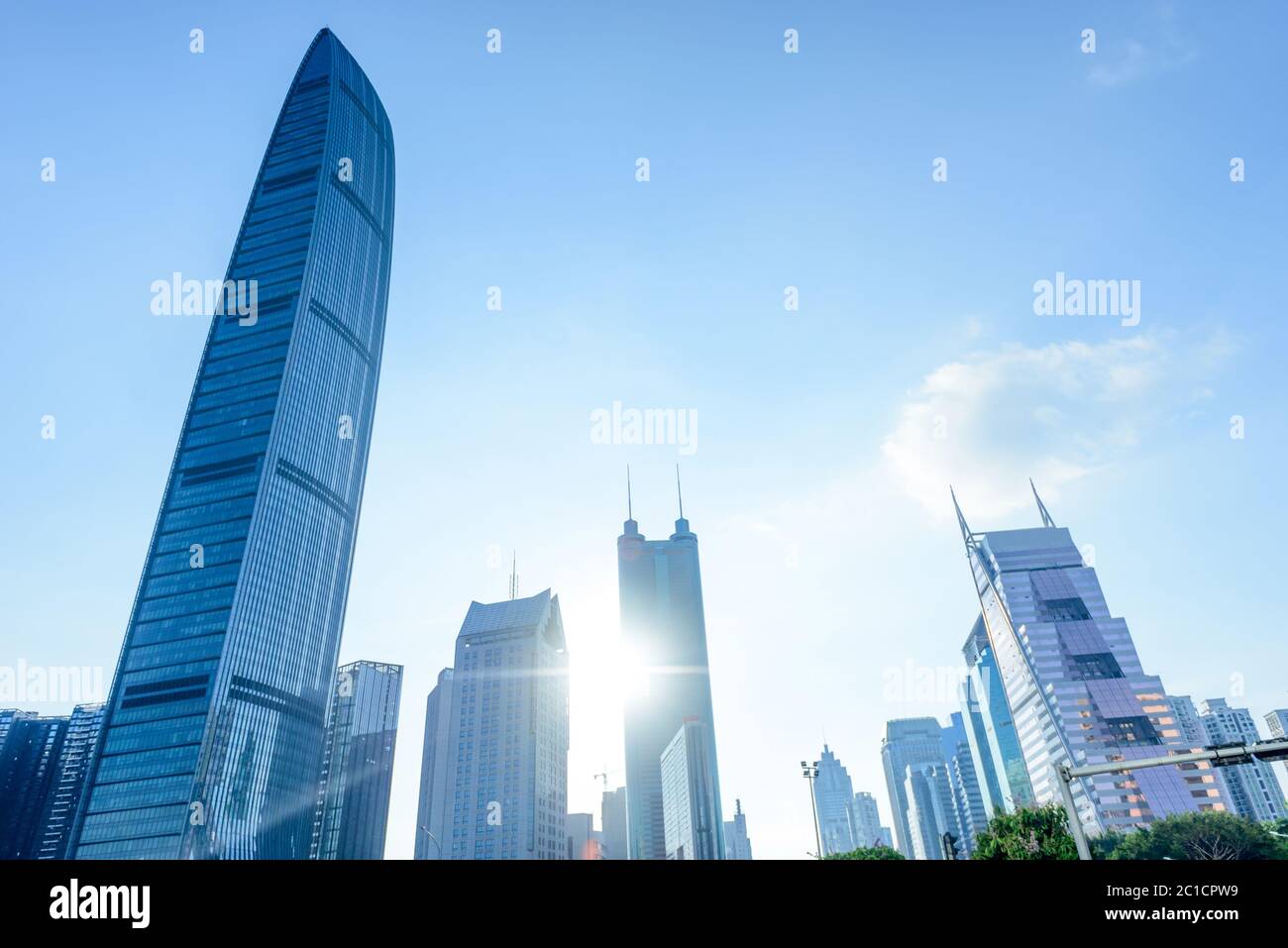 skyscrapers of a modern city with overlooking perspective under blue ...