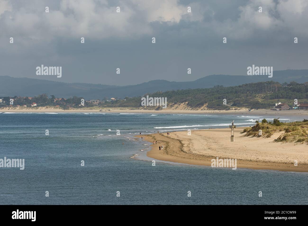 People enjoying a summer day on a beach in Santander, Spain Stock Photo ...
