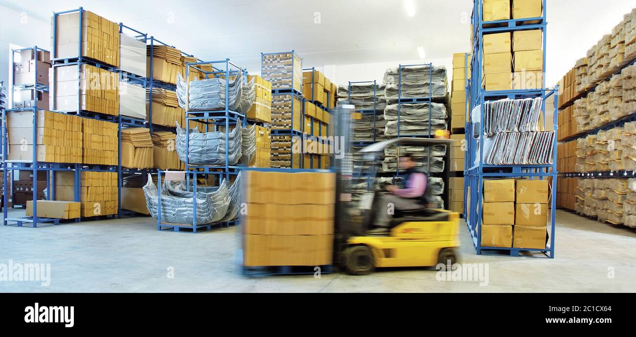 Forklift moving goods inside warehouse hi-res stock photography and ...
