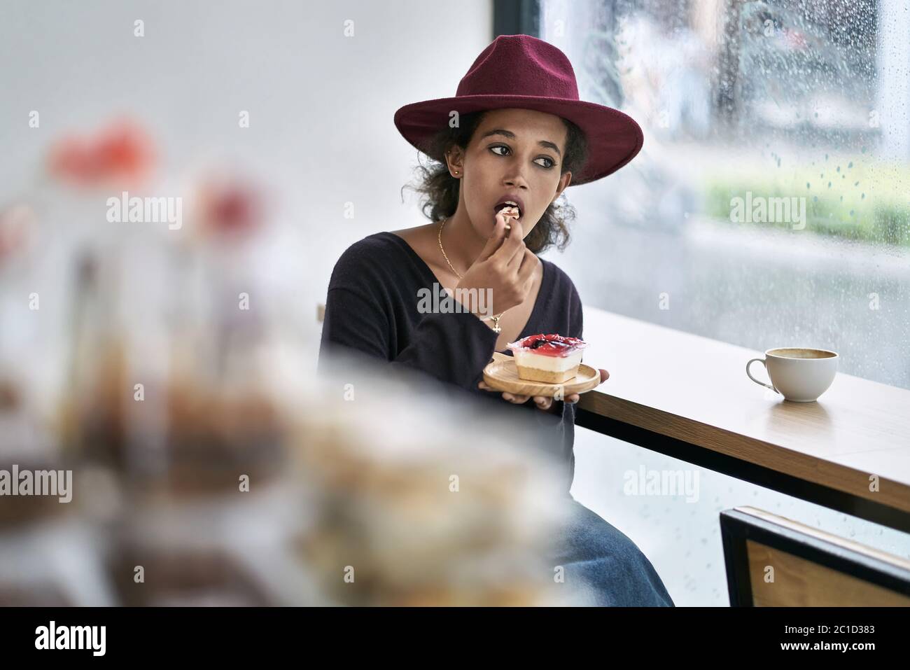 Beautiful girl in cafe Stock Photo - Alamy