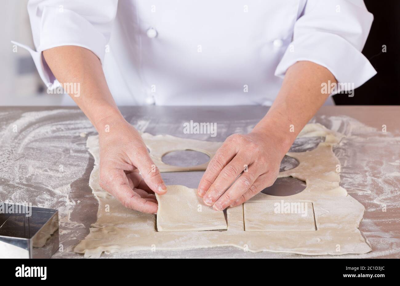Pastry kneading a dough of a cake Stock Photo - Alamy