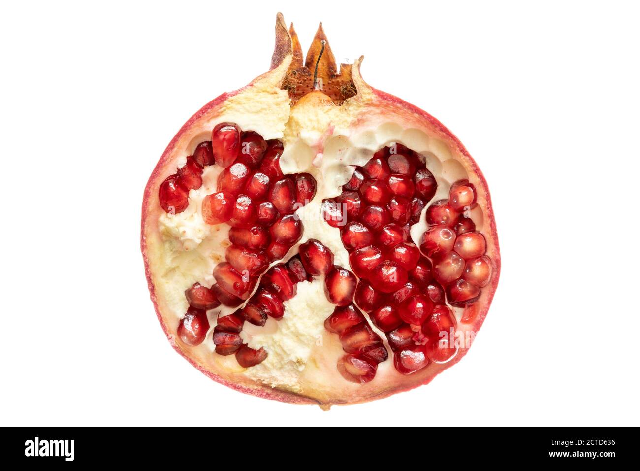 Half of pomegranate isolated Stock Photo - Alamy