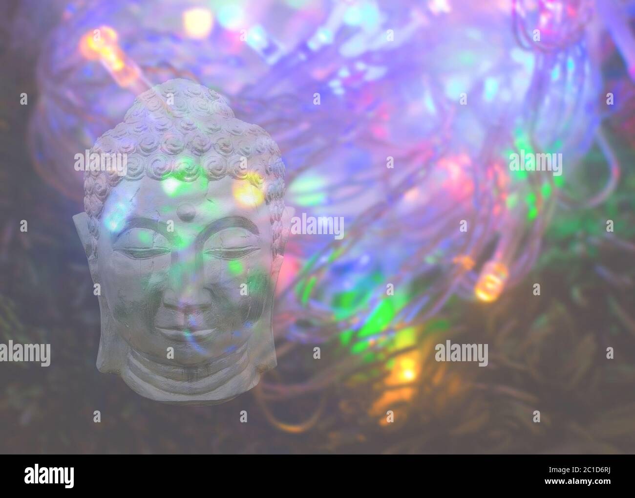 Buddha head on colourful psychedelic light Stock Photo - Alamy