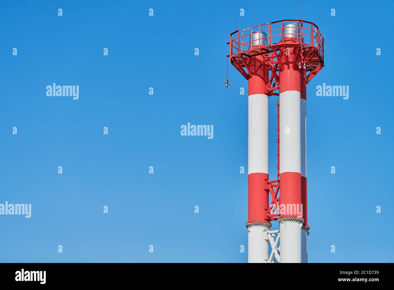 Factory chimney, copy space. Red and white. Industrial pipe without ...