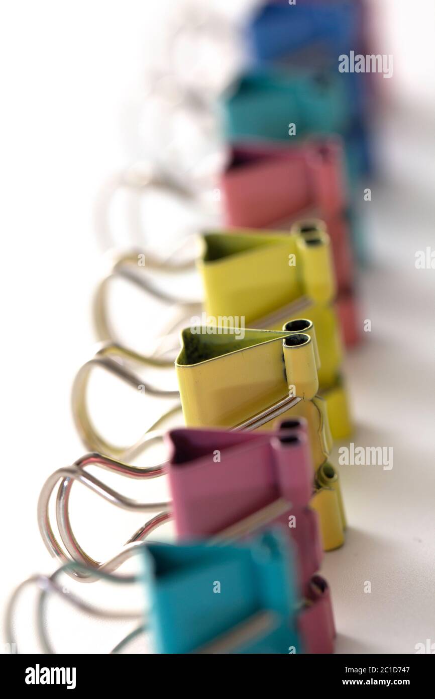 colorful paper clip, desk office concept, copy space, on white ...