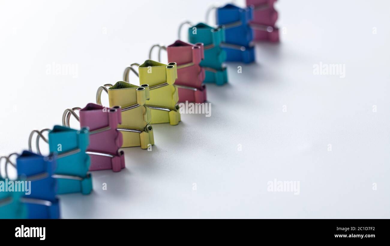 colorful paper clip, desk office concept, copy space, on white ...