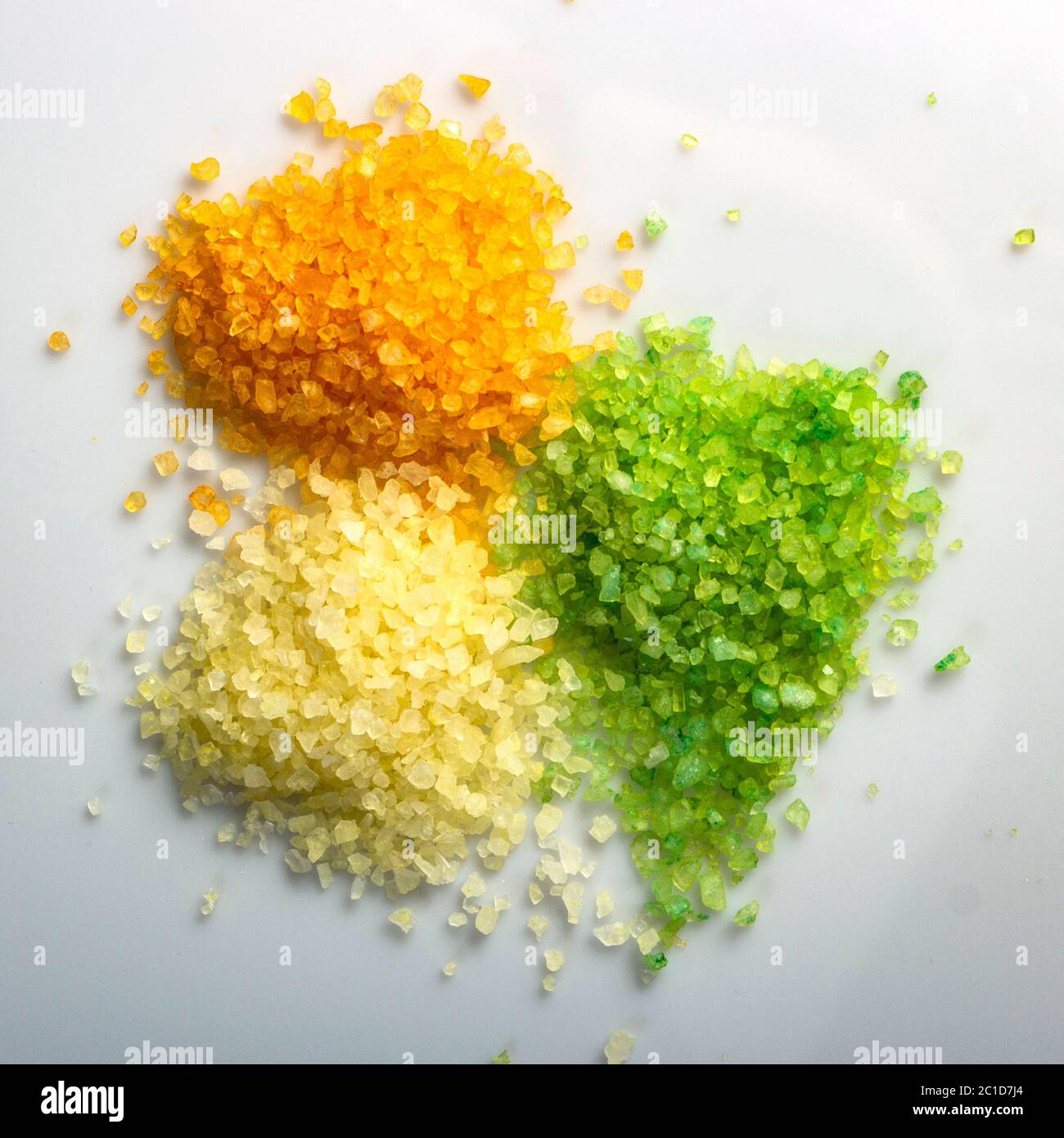 Pile of Multicolored himalayan salt on white background Stock Photo - Alamy