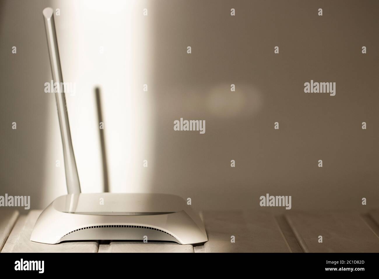 isolated white access point on table in office Stock Photo - Alamy