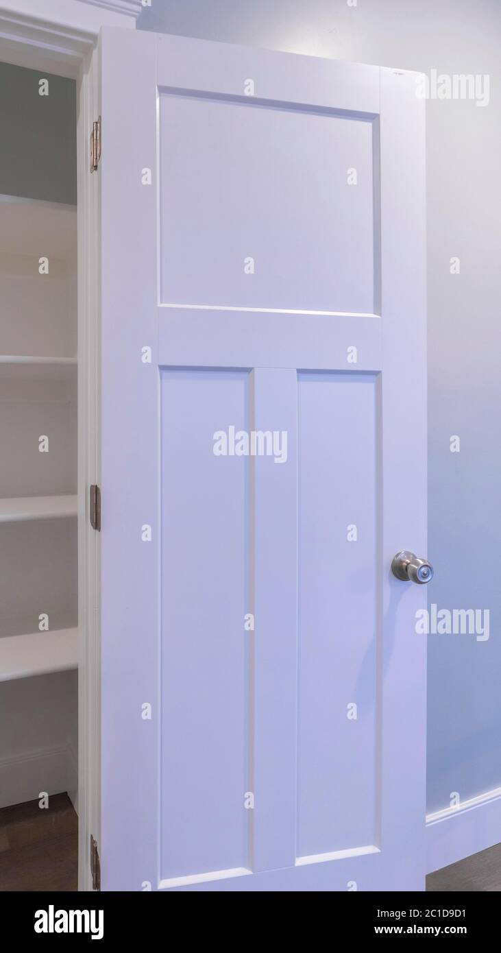 Vertical Open empty fitted cupboard or wardrobe interior Stock Photo ...