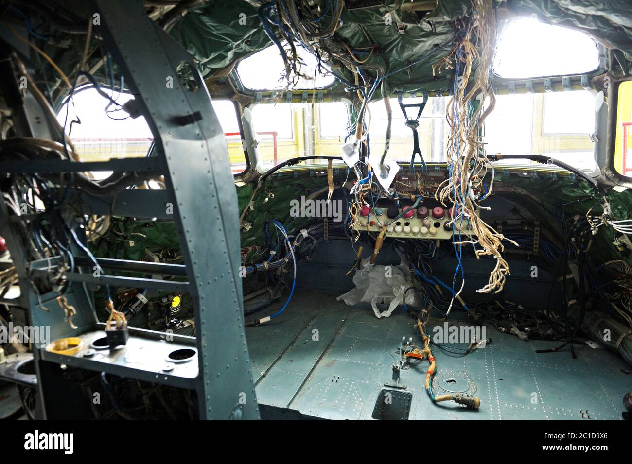 Cockpit in the process of repair. Cables hanging down, dissembled ...