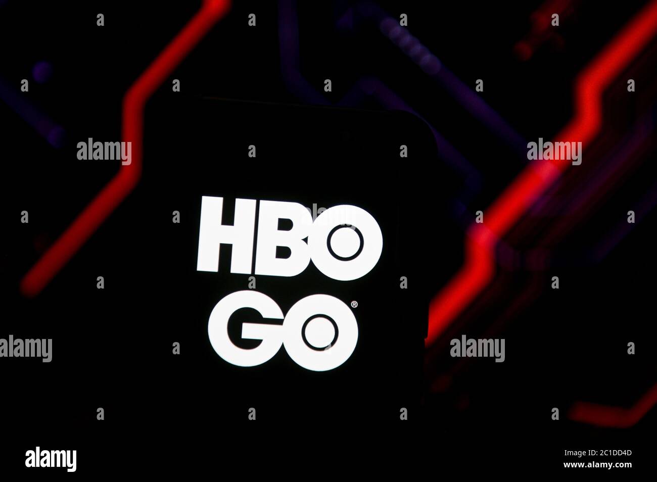 In this photo illustration an HBO Go logo seen displayed on a smartphone Stock Photo - Alamy