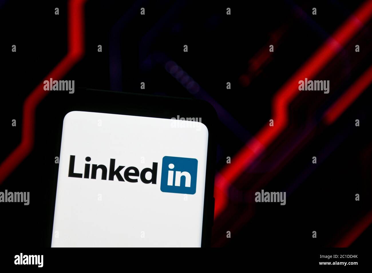 In this photo illustration a LinkedIn logo seen displayed on a ...