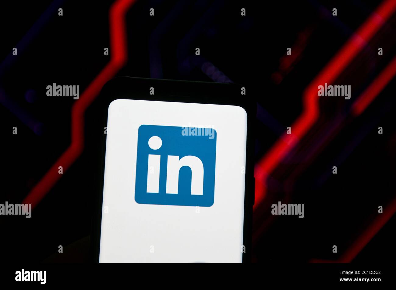 In this photo illustration a LinkedIn logo seen displayed on a ...