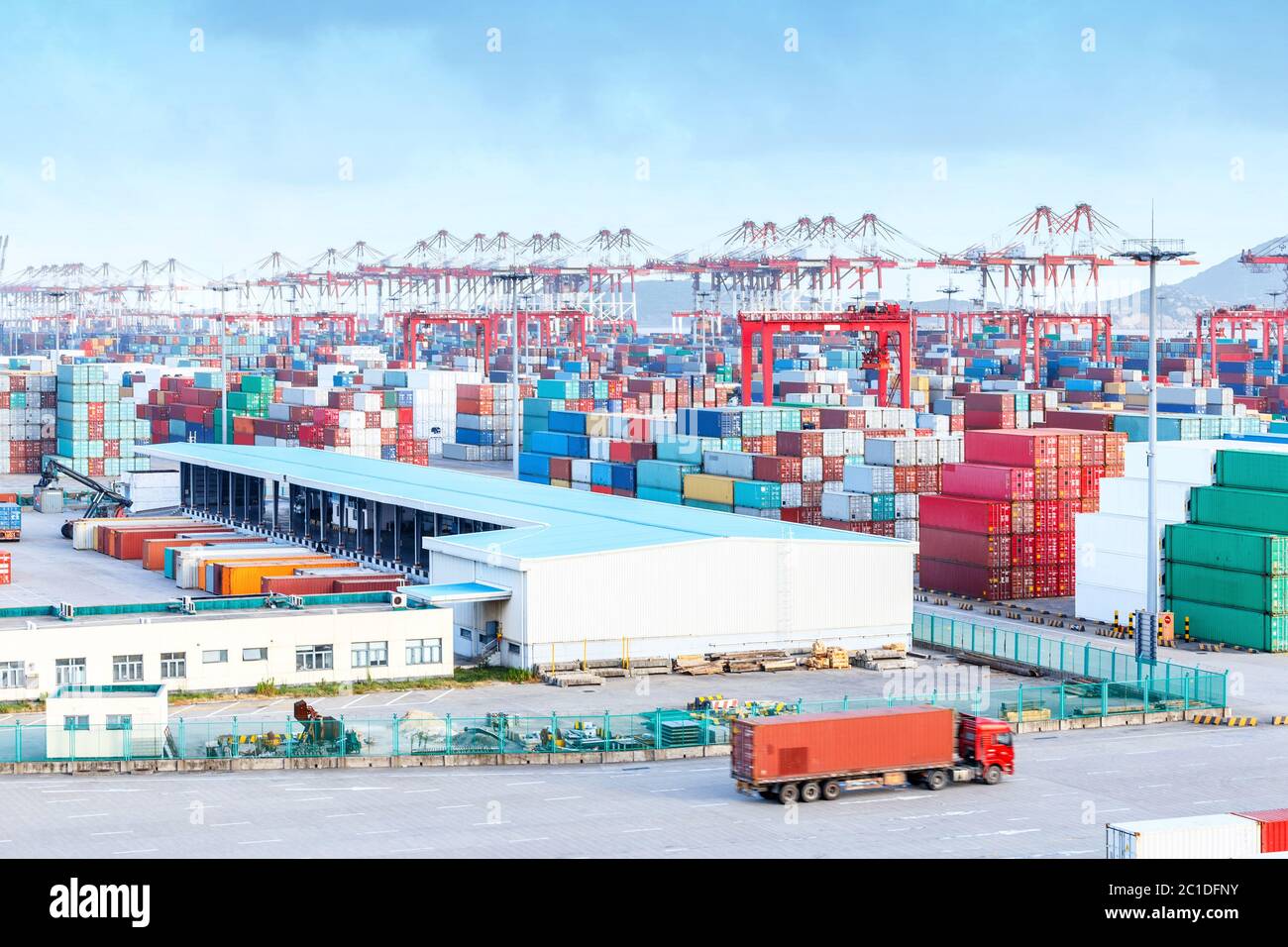 busy harbour with full loads of containers in the port Stock Photo - Alamy