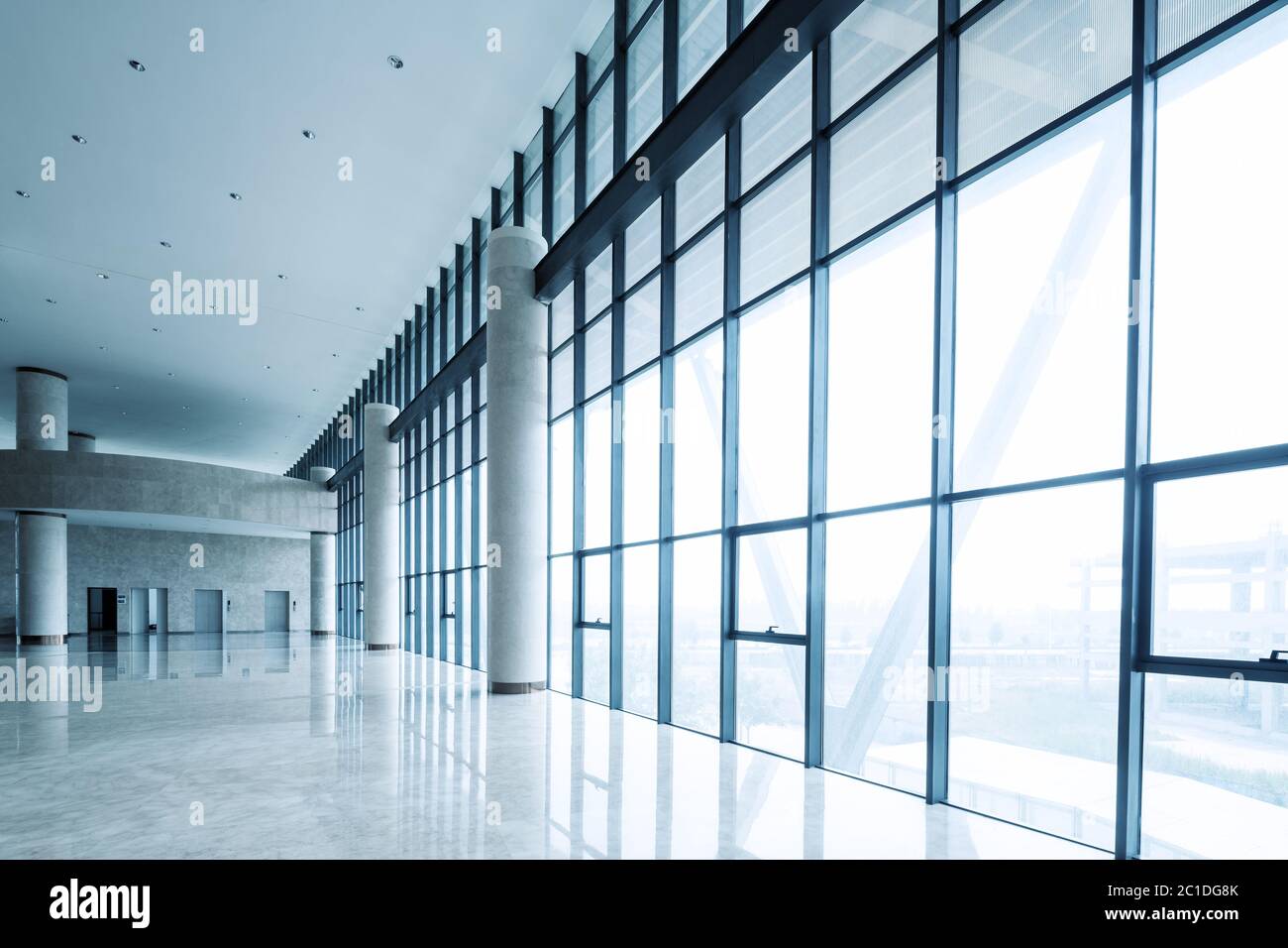 modern business hall interior with glass wall Stock Photo - Alamy