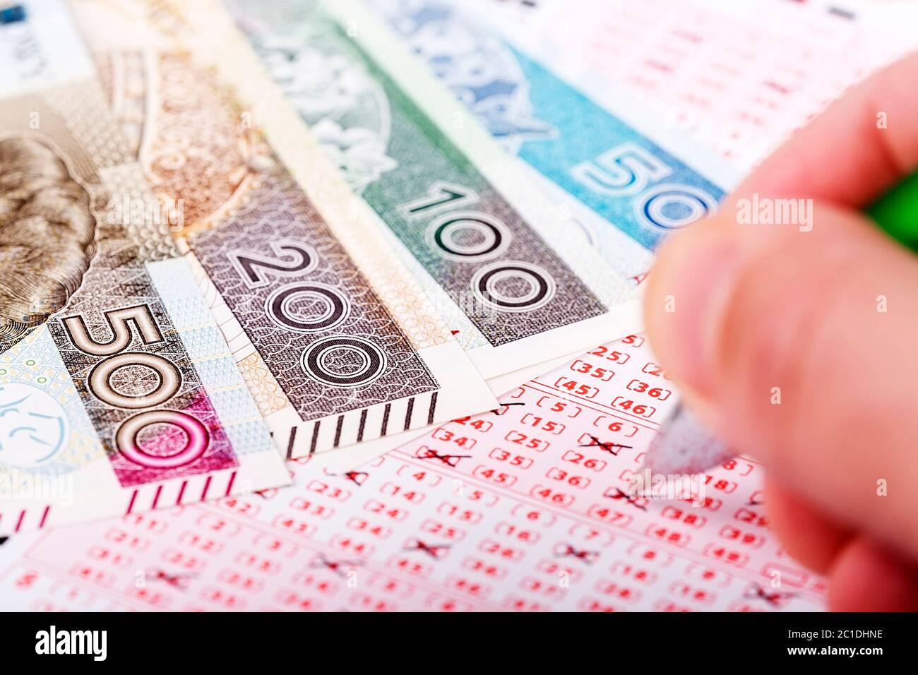 Lottery ticket with a pen and Polish money Stock Photo - Alamy