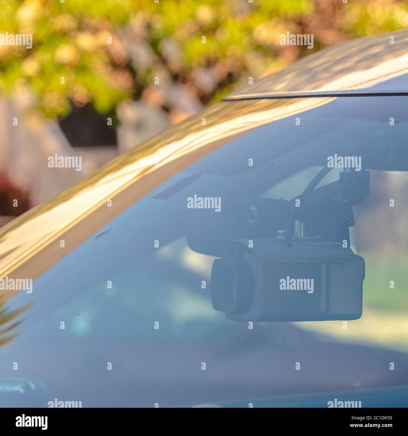 Square Windshield of sheriffs car with dashboard camera Stock Photo - Alamy