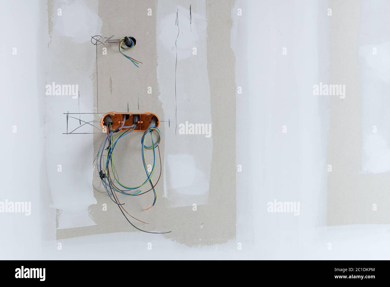 Background of dry wall and electrical cable box. Indoor construction ...