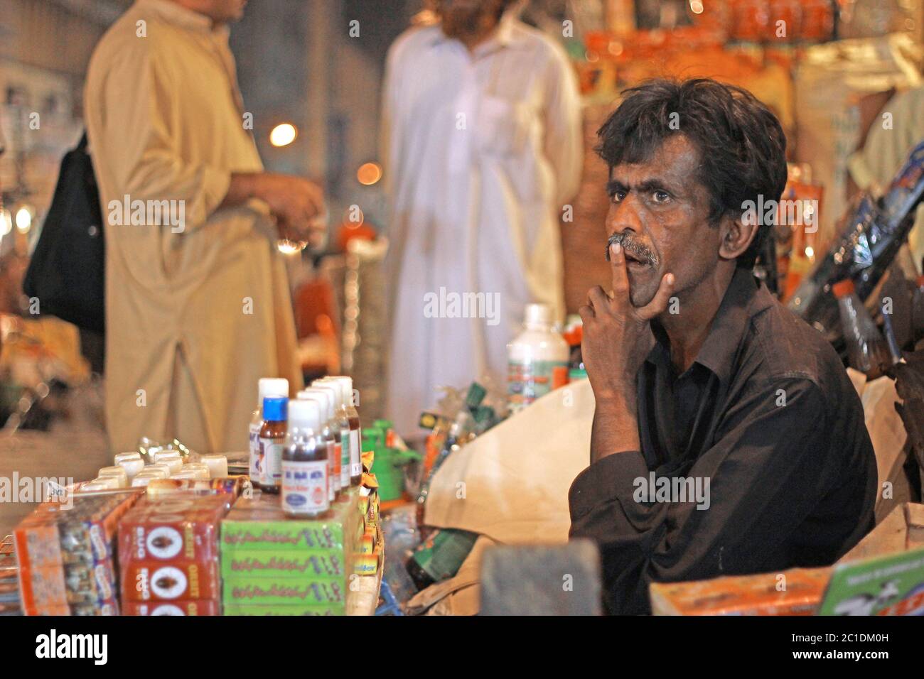 Shop keeper sitting and thinking in saddar bazaar, Karachi, Pakistan 13 ...