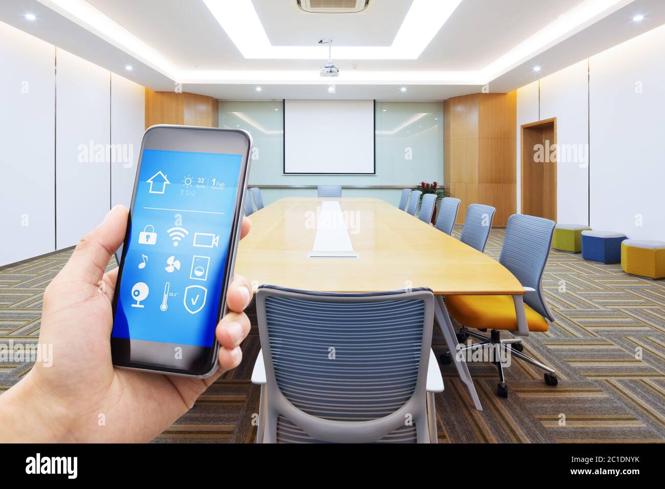 mobile phone with smart home apps in modern meeting room Stock Photo ...