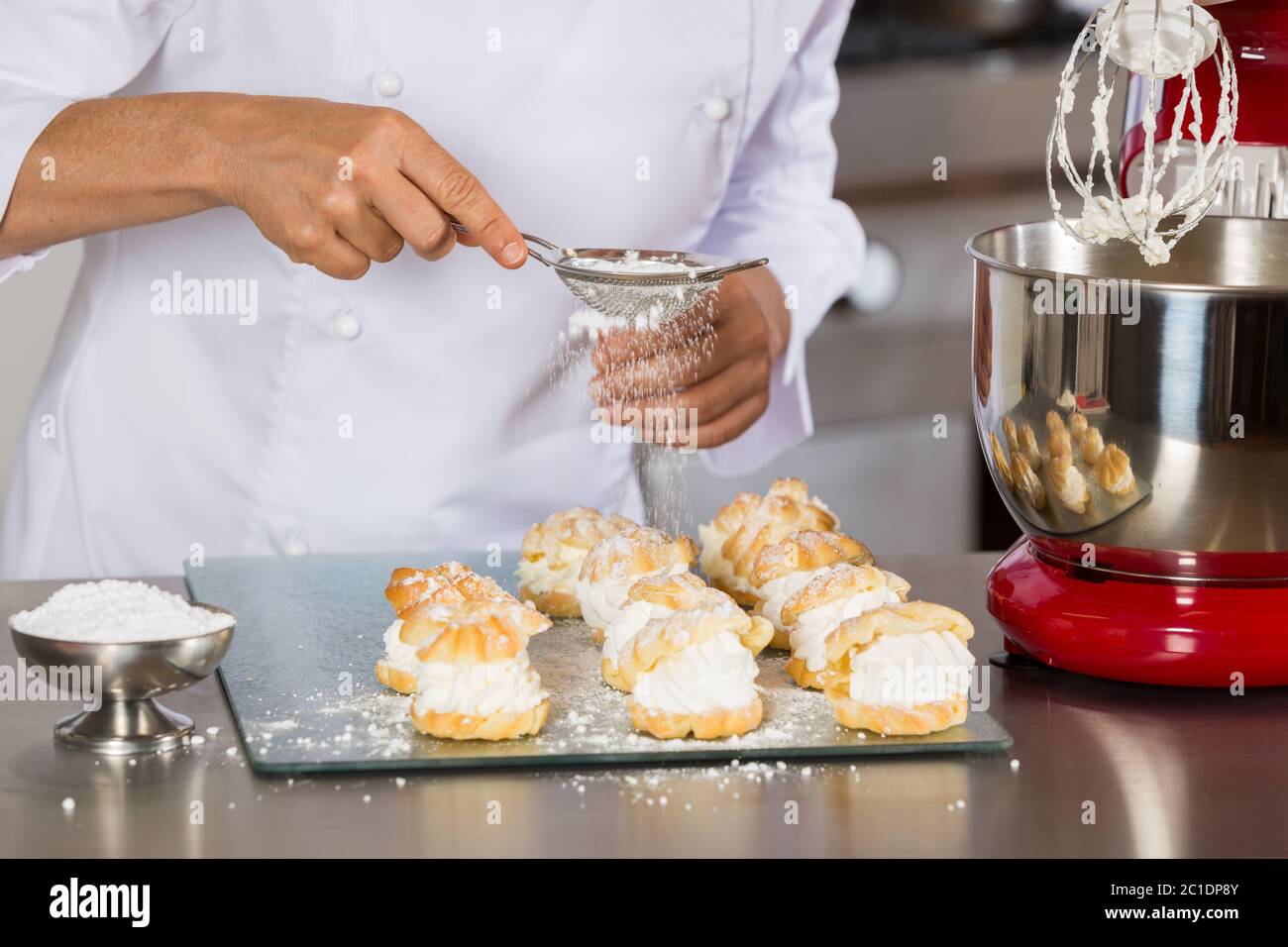 Female chef decorating tasty hi-res stock photography and images - Alamy