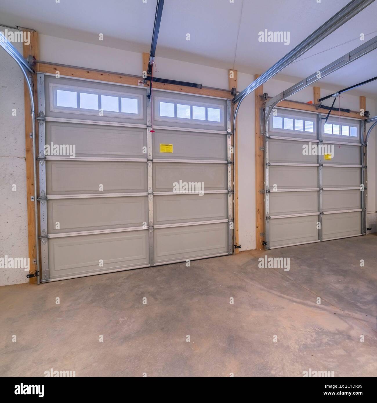 Square Inside an empty double vehicle garage interior Stock Photo - Alamy