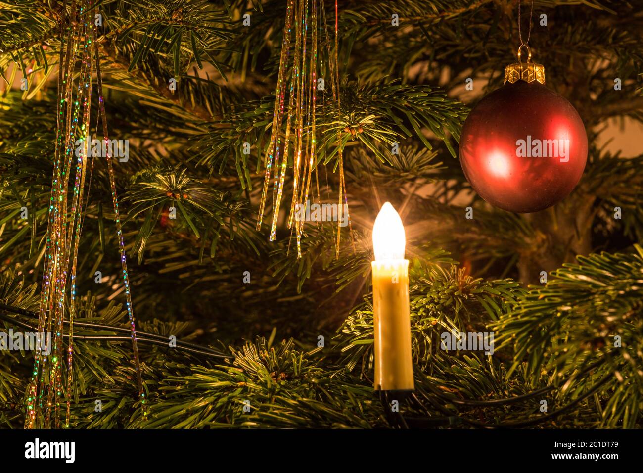 Christmas ball in the candlelight Stock Photo - Alamy