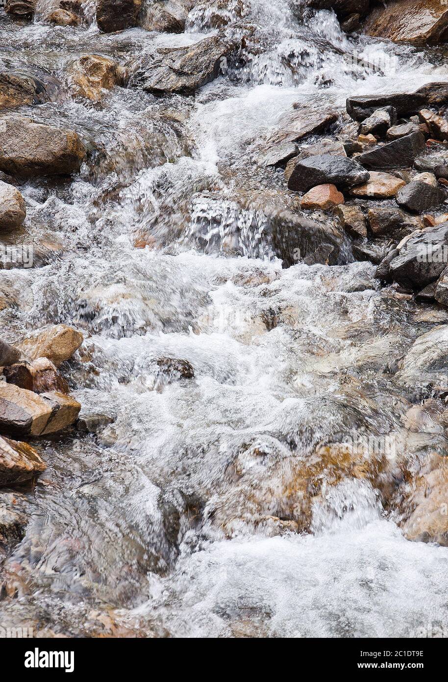 Closeup waterfall foaming water Stock Photo - Alamy