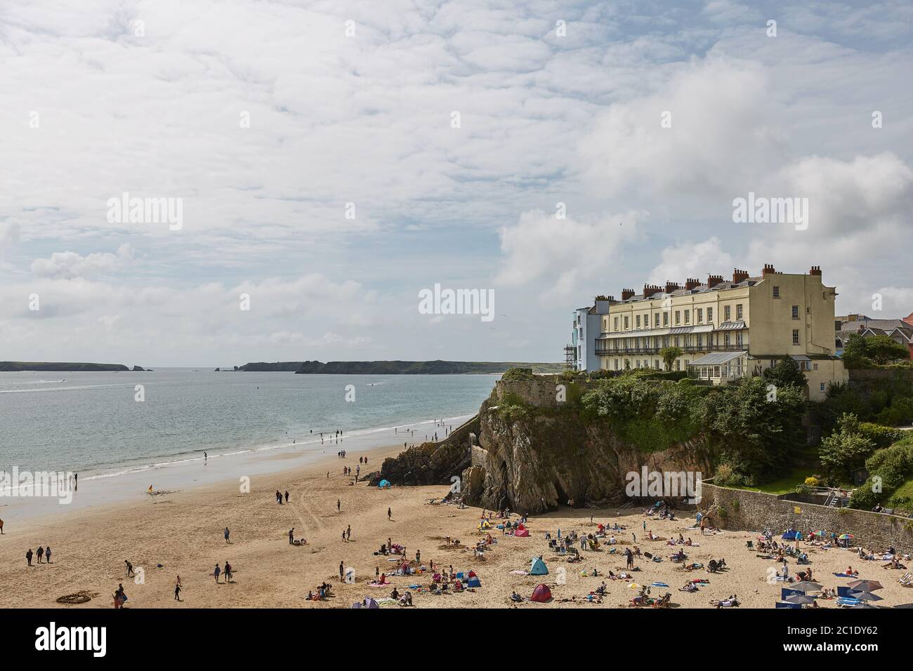 People on beach in Tenby, Wales, UK Stock Photo - Alamy