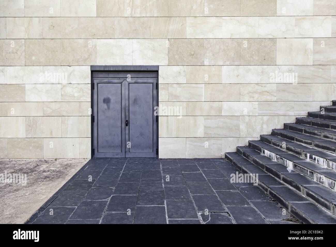 Stairs and door in modern building Stock Photo - Alamy