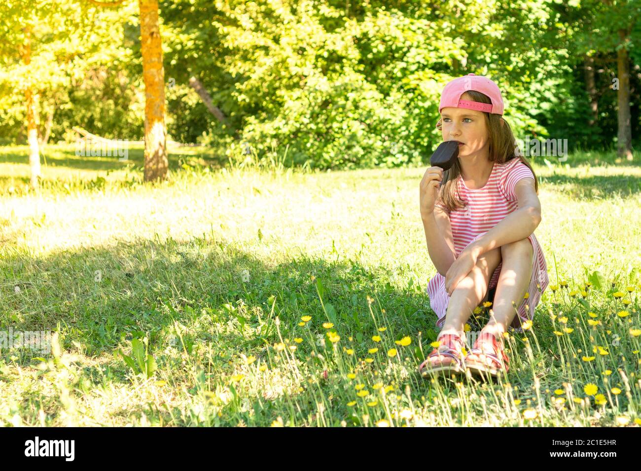 Little girl eating chocolate ice cream Stock Photo - Alamy Little girl eating chocolate ice cream Stock Photo - Alamy