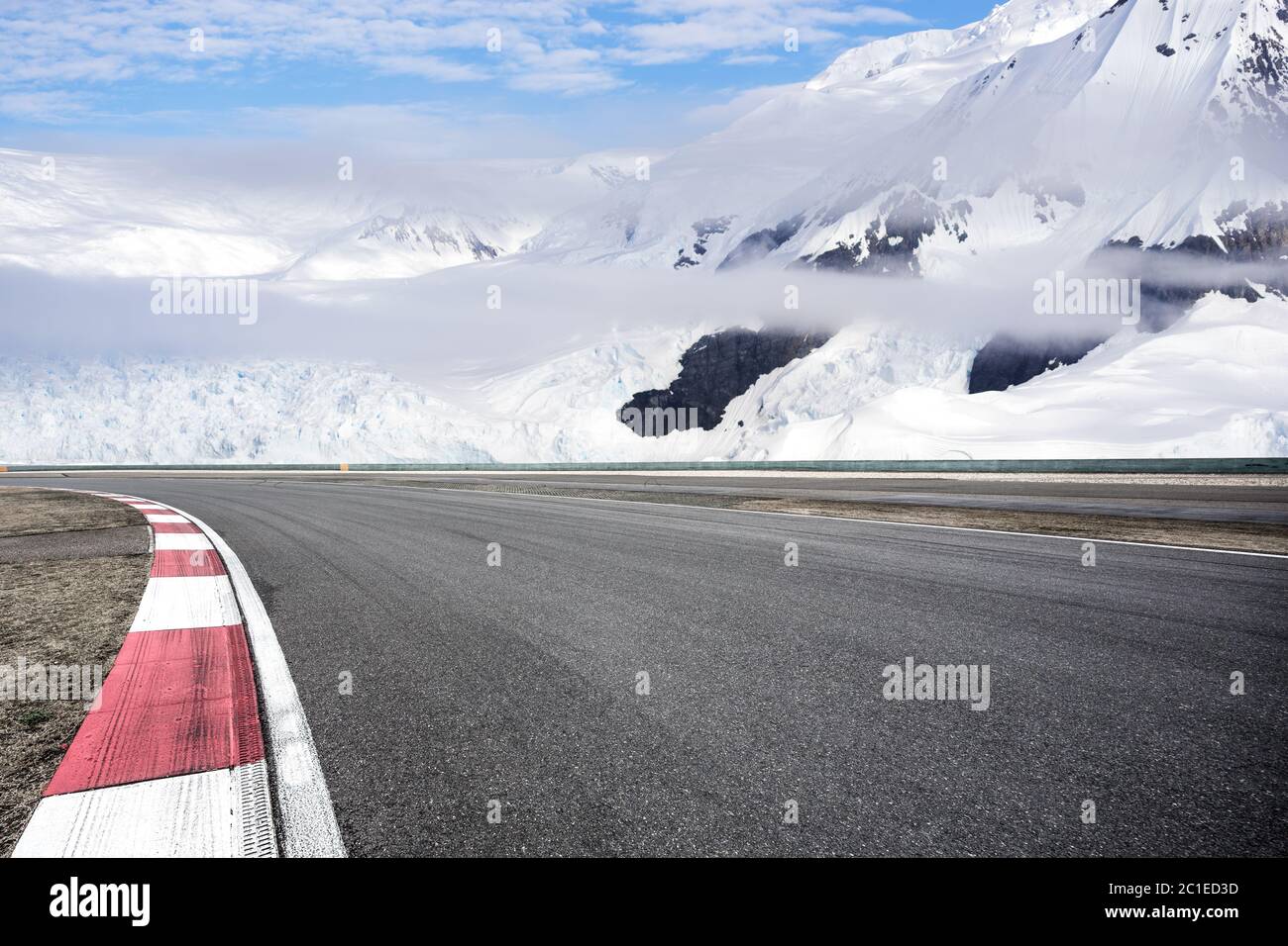 race track and snow mountain Stock Photo - Alamy