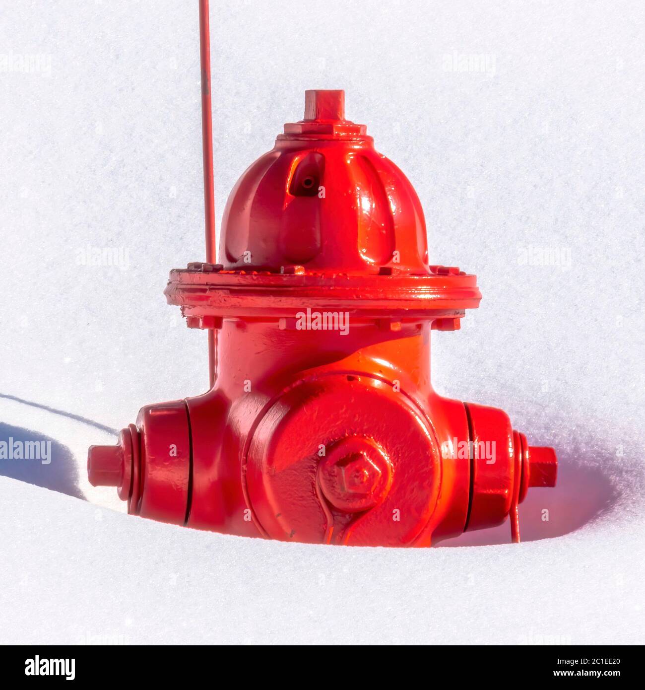 Square Vibrant red fire hydrant buried in snow during winter in Park ...