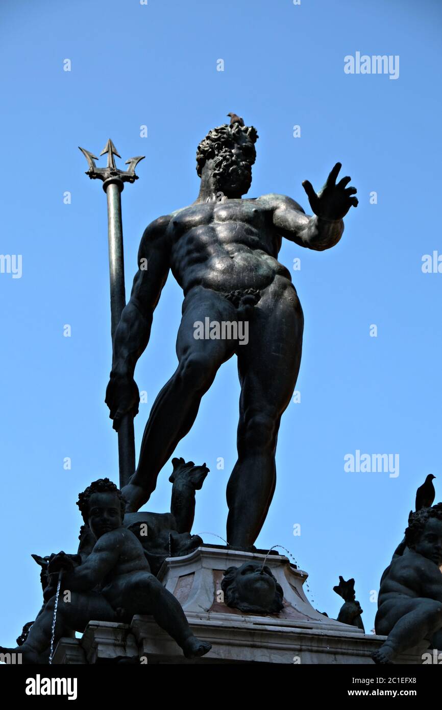 low angle view of the Neptune statue in the Neptune square in Bologna ...