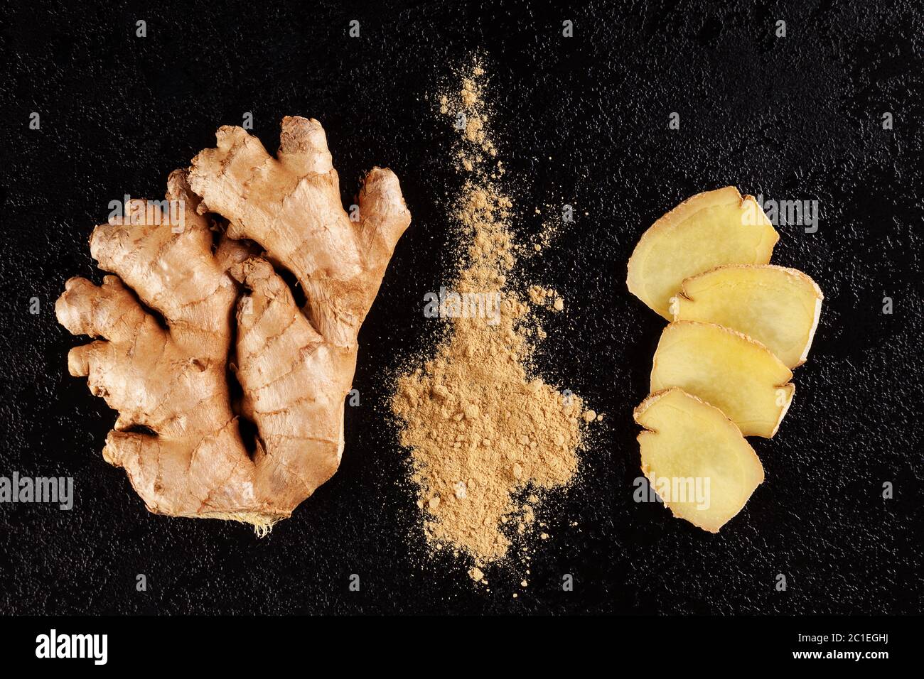 Fresh and ground ginger root Stock Photo - Alamy