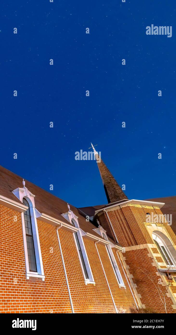 Vertical frame Vivid blue sky over a church in Provo Utah with brick ...