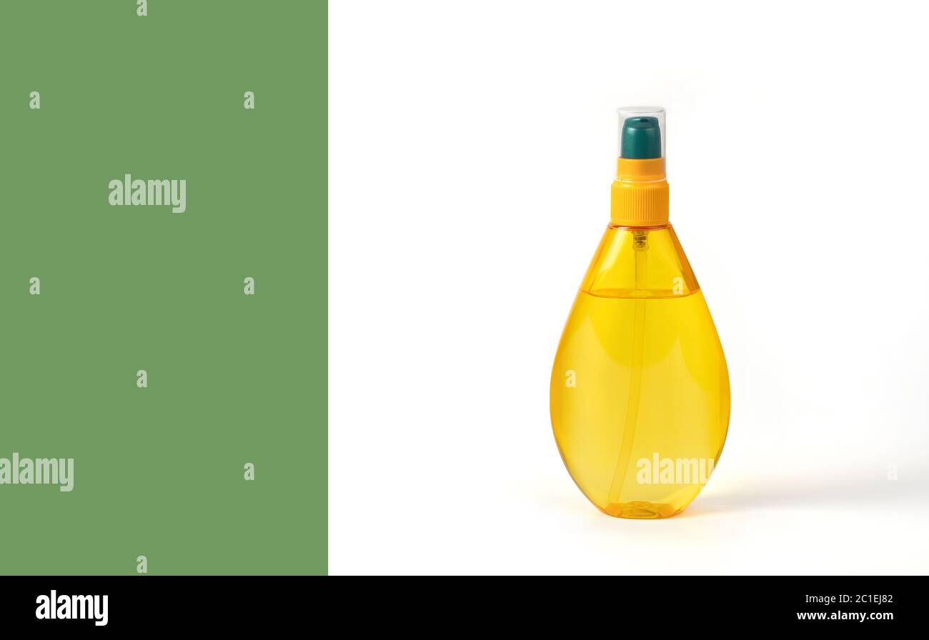 Transparent orange bottle on a white background that can be used for ...