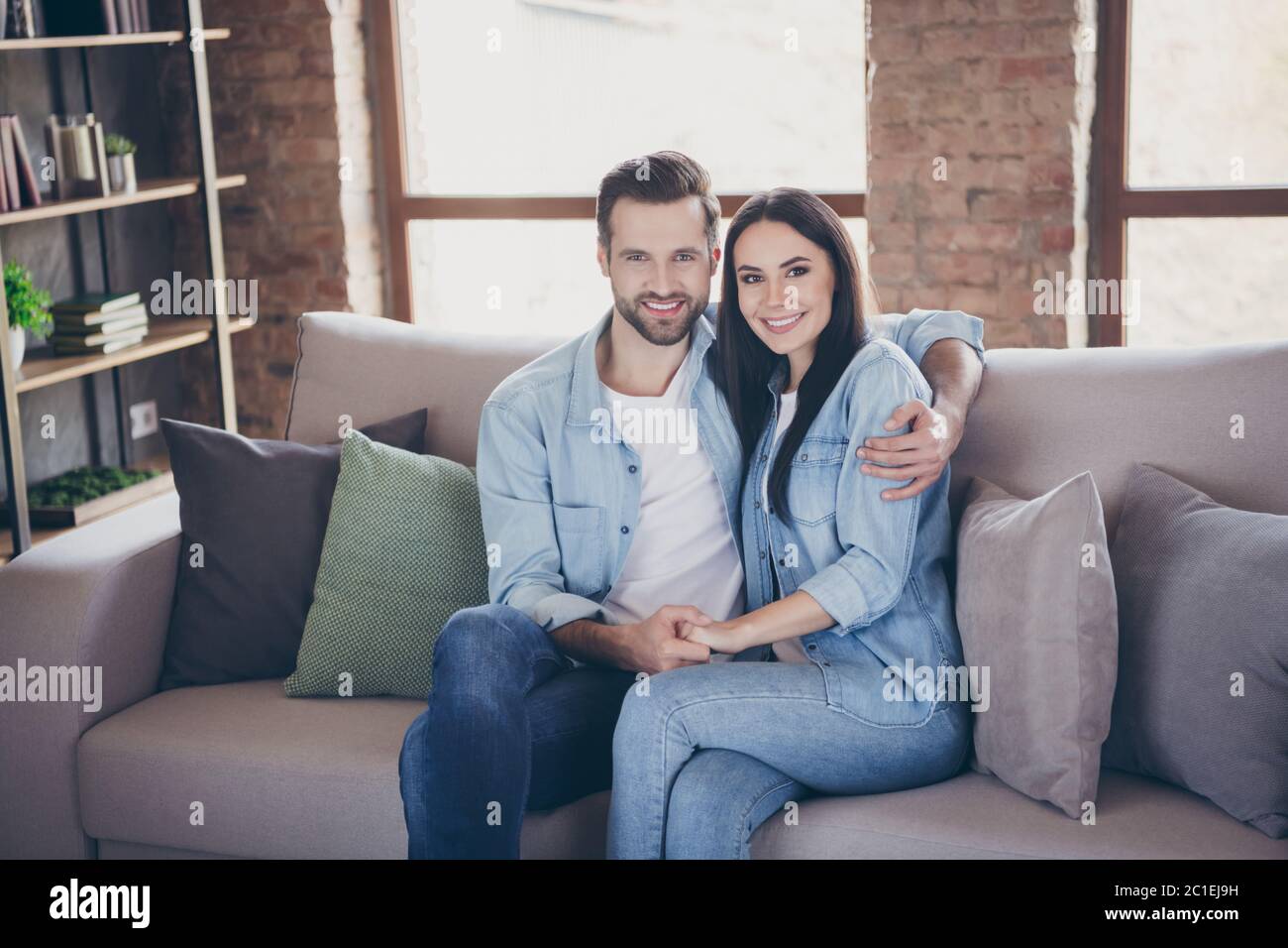 Portrait of positive cheerful spouses man woman hug embrace enjoy ...