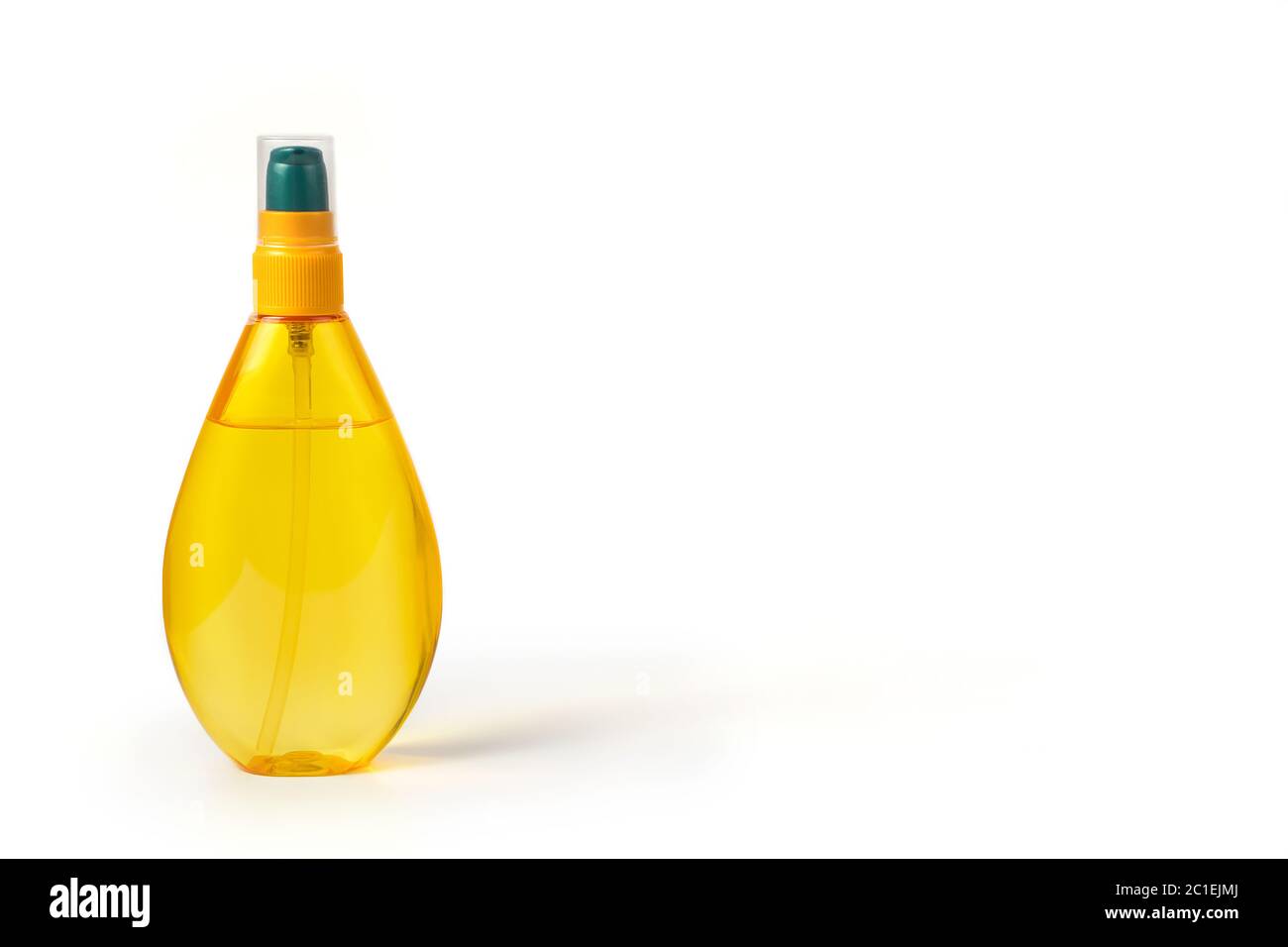 Transparent orange bottle on a white background that can be used for ...