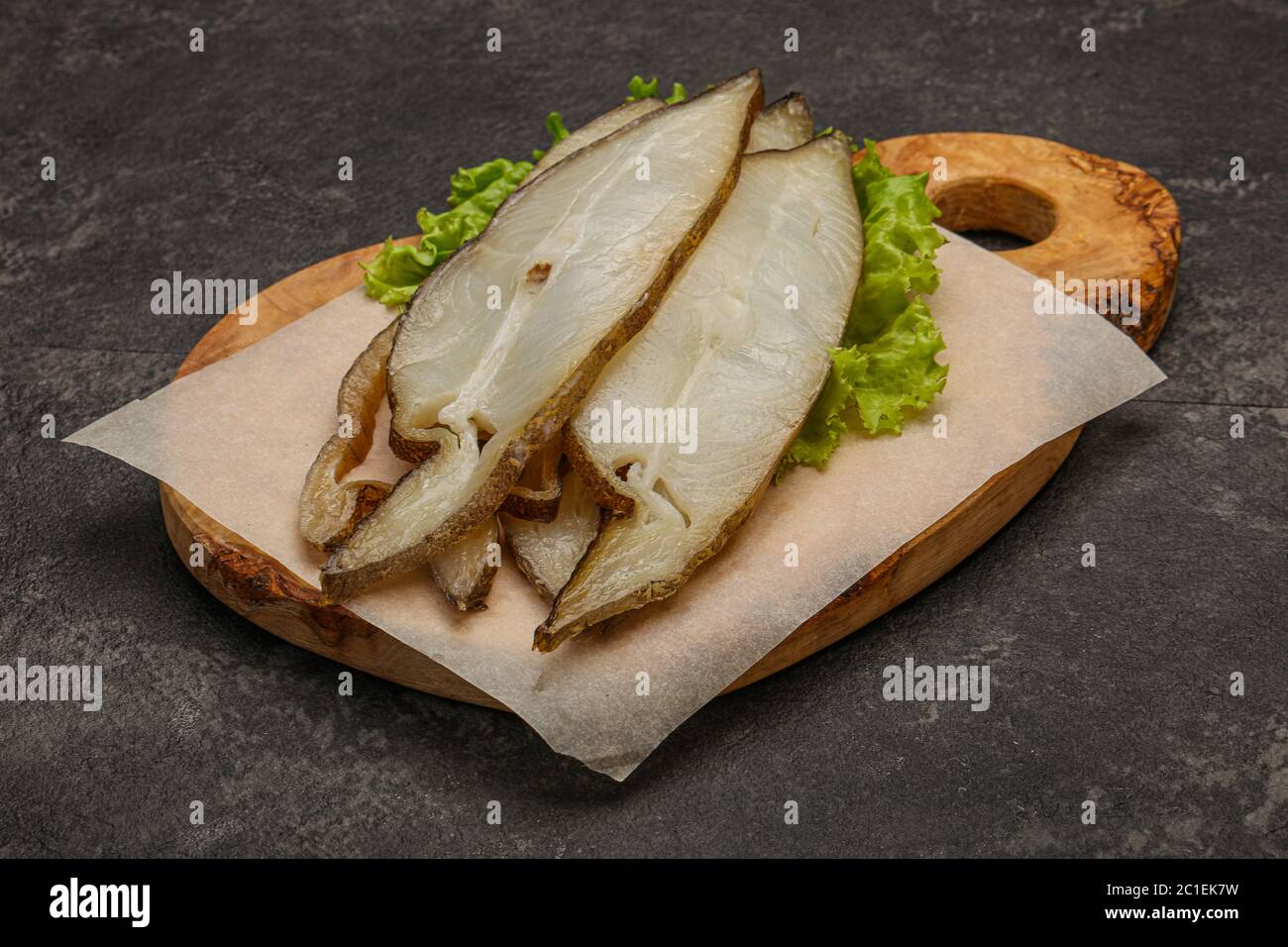 Delicous smoked halibut fish slices snack Stock Photo - Alamy