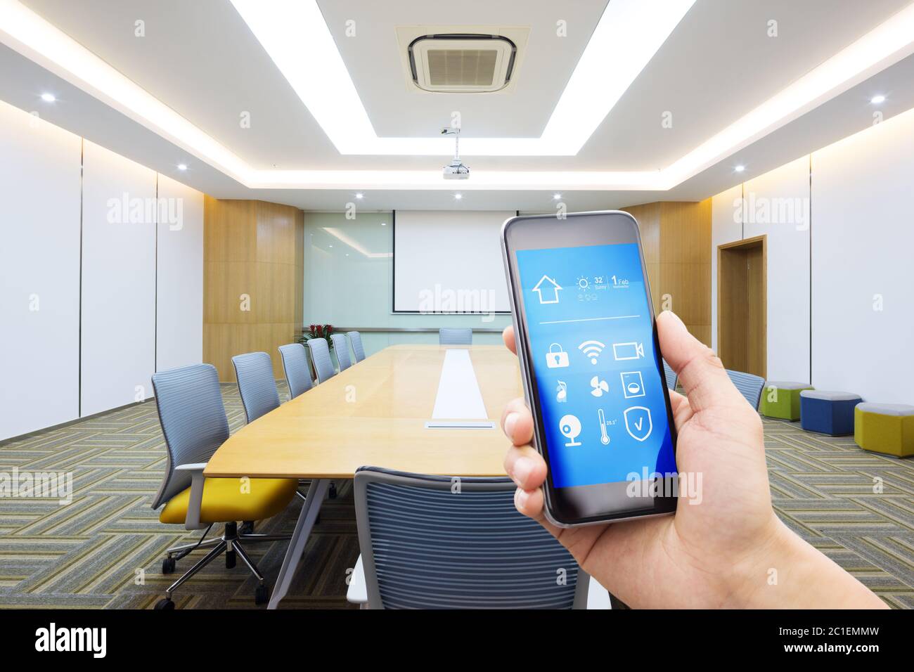 mobile phone with smart home app in modern living room Stock Photo - Alamy