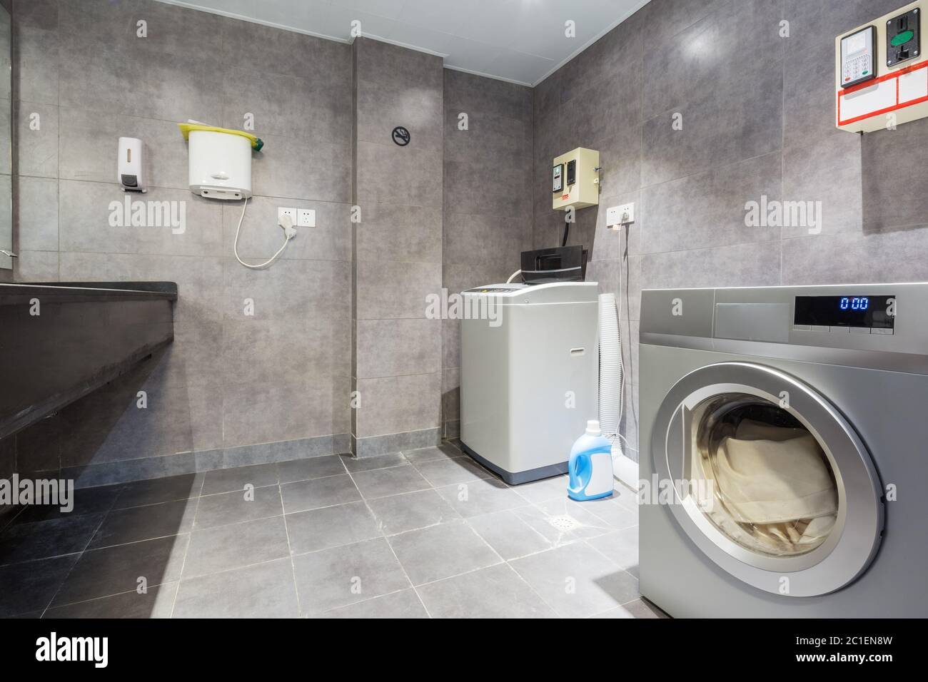 mobile phone with smart home app in modern living room Stock Photo - Alamy