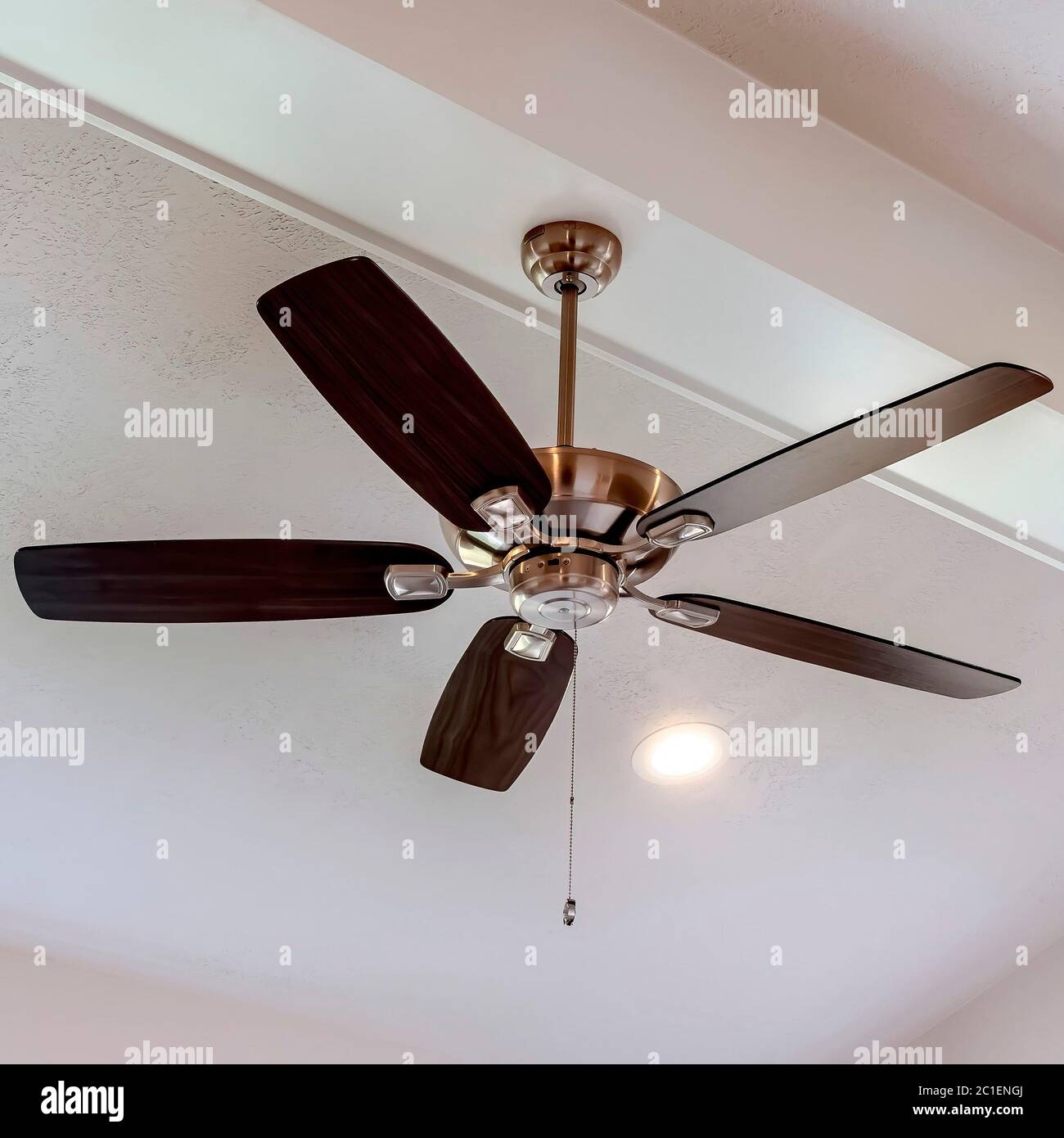 Square Decorative wood beam with standard ceiling fan and lights inside ...