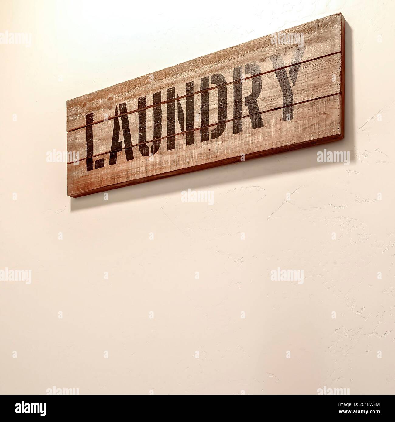 Square crop Laundry room interior with woven basket and decorative ...