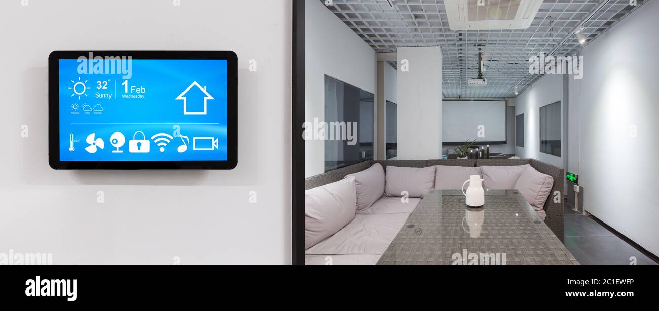smart screen with smart home apps on wall in modern living room Stock ...