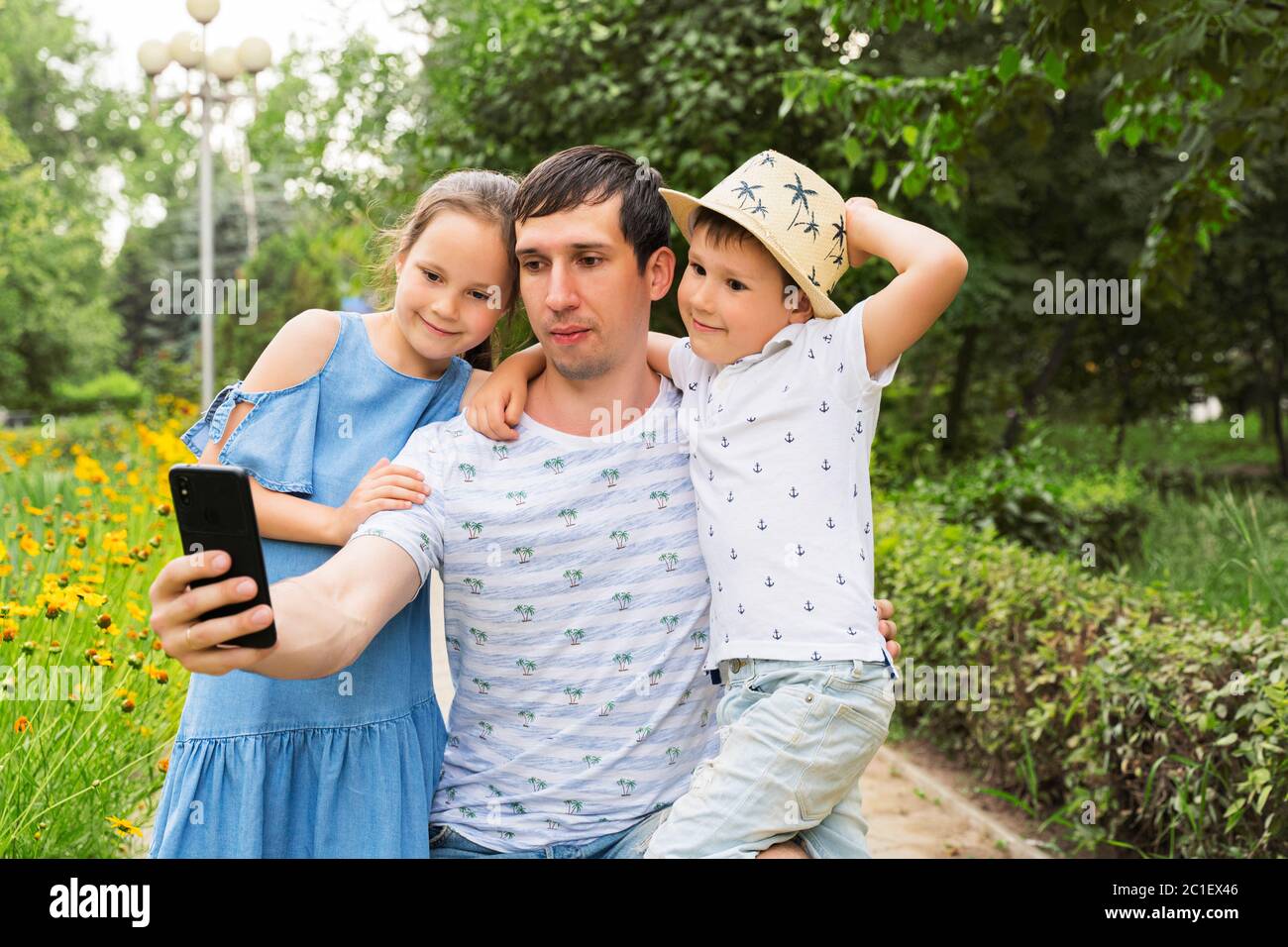 happy dad and kids take selfies. children's day Stock Photo - Alamy
