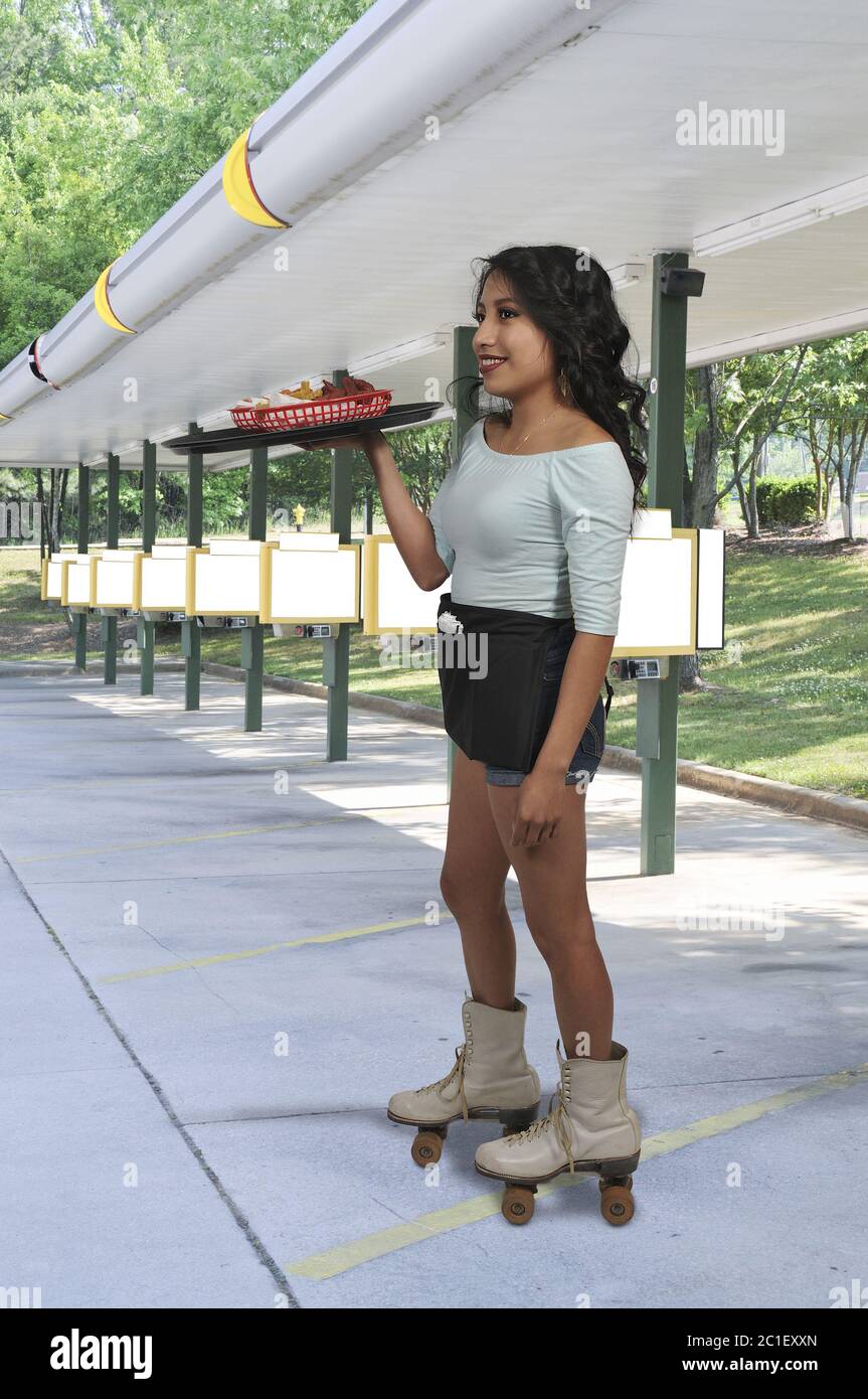 Woman server or waitress on roller skates Stock Photo - Alamy
